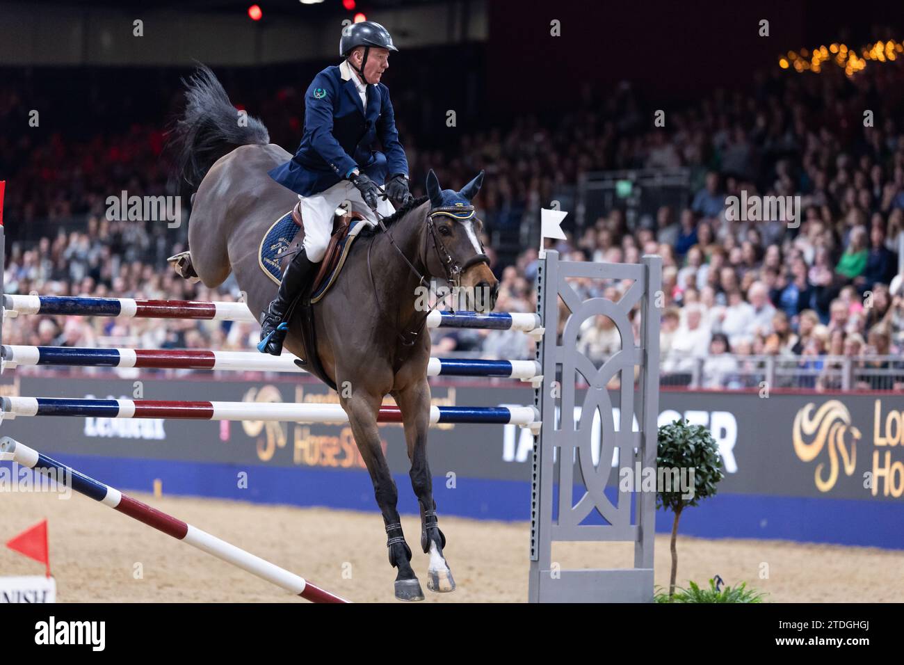 London, UK. 18th Dec, 2023. John Whitaker of Great Britain with Sharid ...