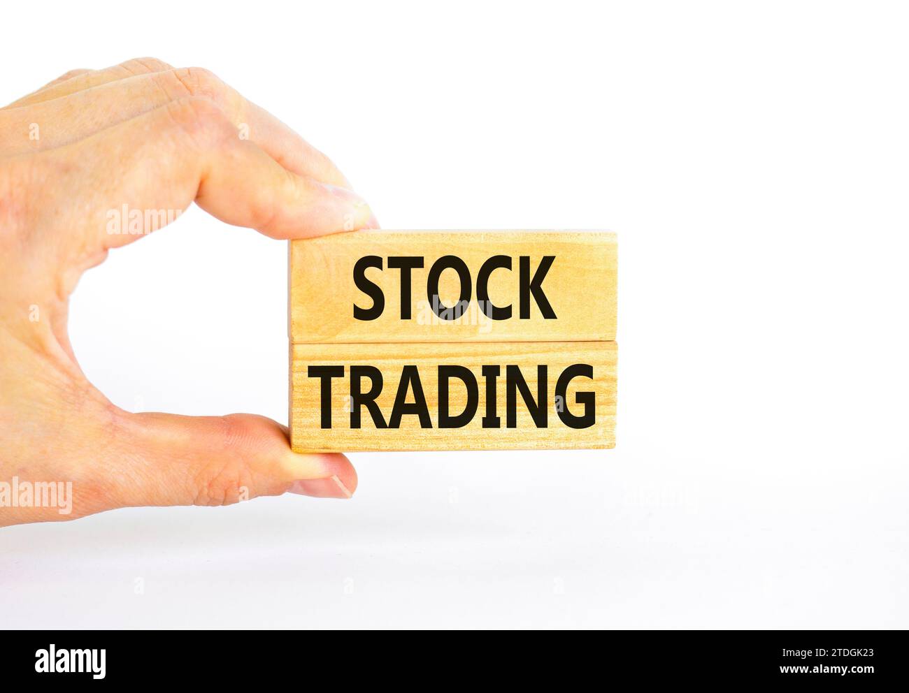 Stock trading symbol. Concept words Stock trading on beautiful wooden ...