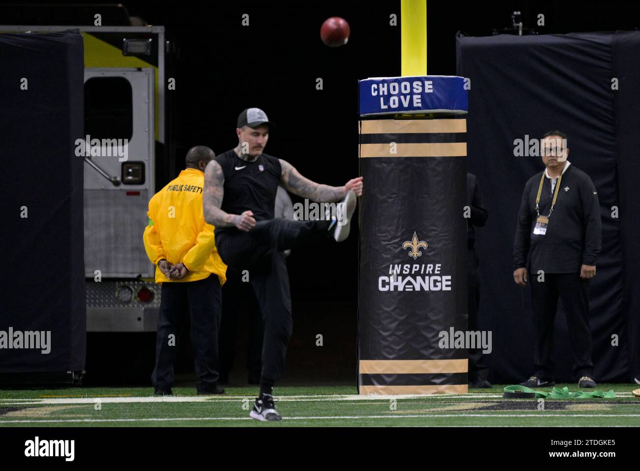 New Orleans Saints punter Lou Hedley (39) warms up in front of "inspire ...