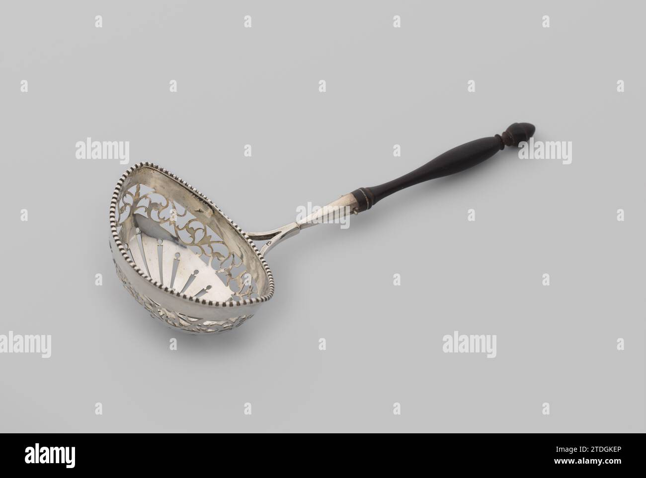 Sugar sprinkle with oval, openwork container with pearl edge and wooden ...