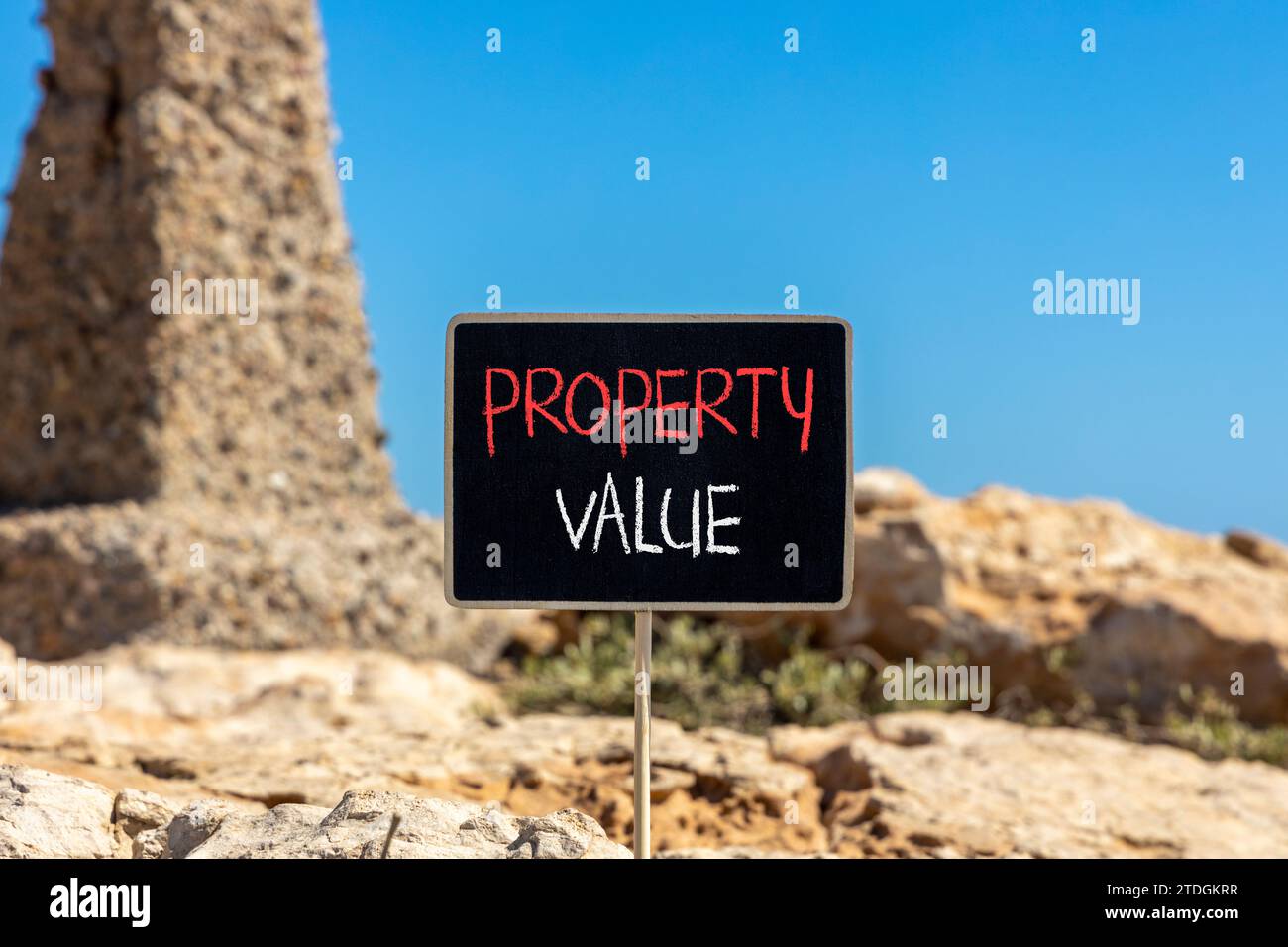 Property value symbol. Concept words Property value on beautiful black ...
