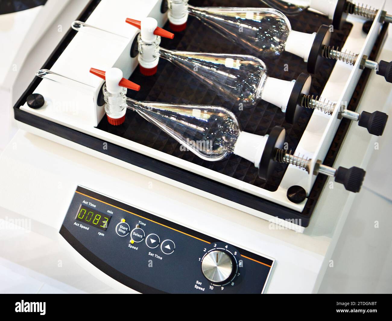 Laboratory reciprocating mixer shaker with flasks Stock Photo - Alamy