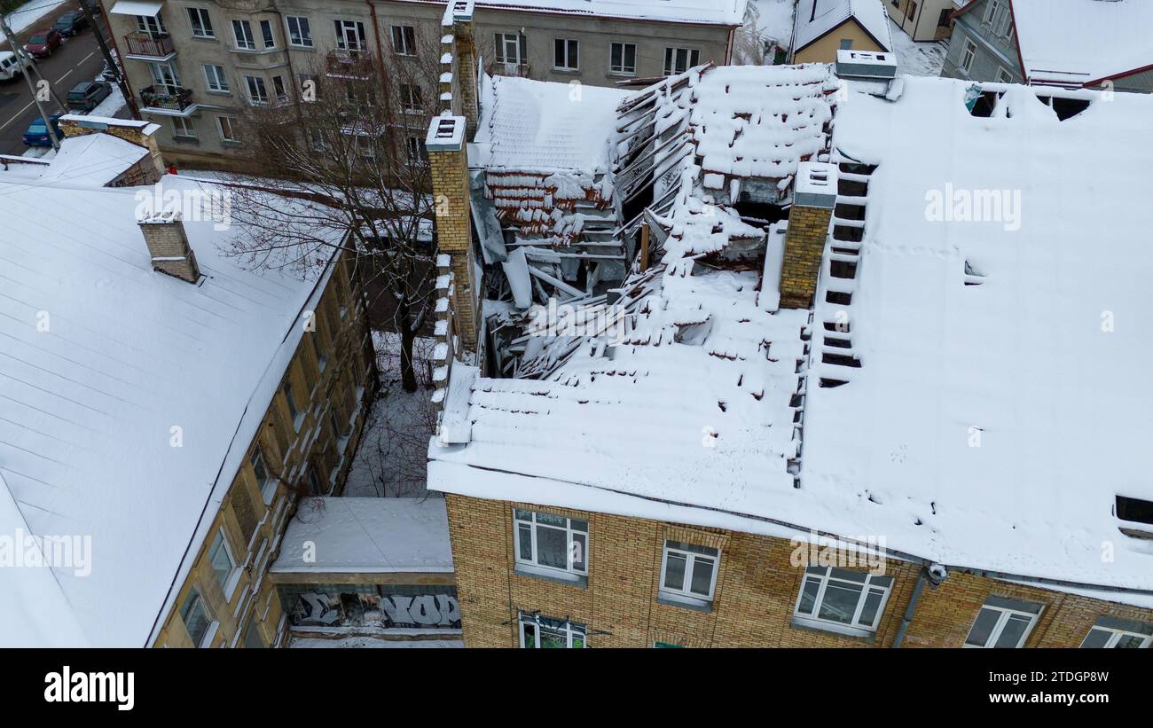 Drone photography of a building with broken rooftop during winter day ...