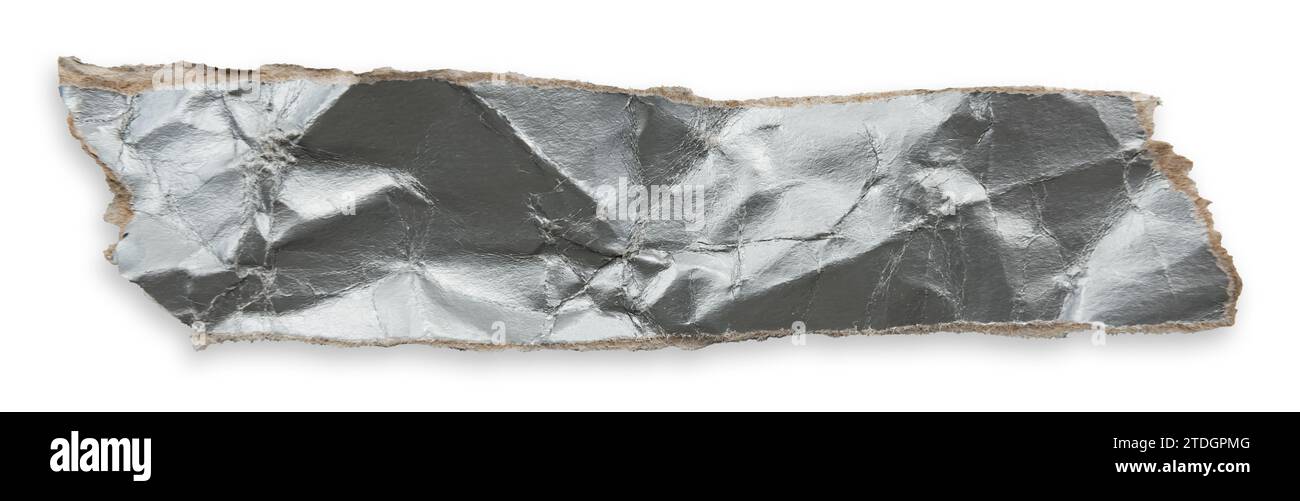 A piece of crumpled silver paper with folds and wrinkles on a white ...
