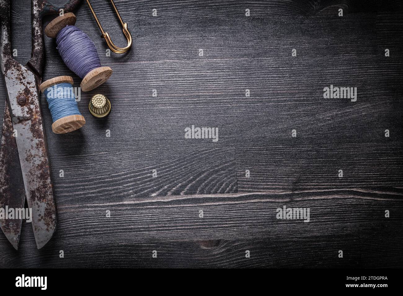 Antique rusty scissors spools of thread thimble clasp pin copyspace ...