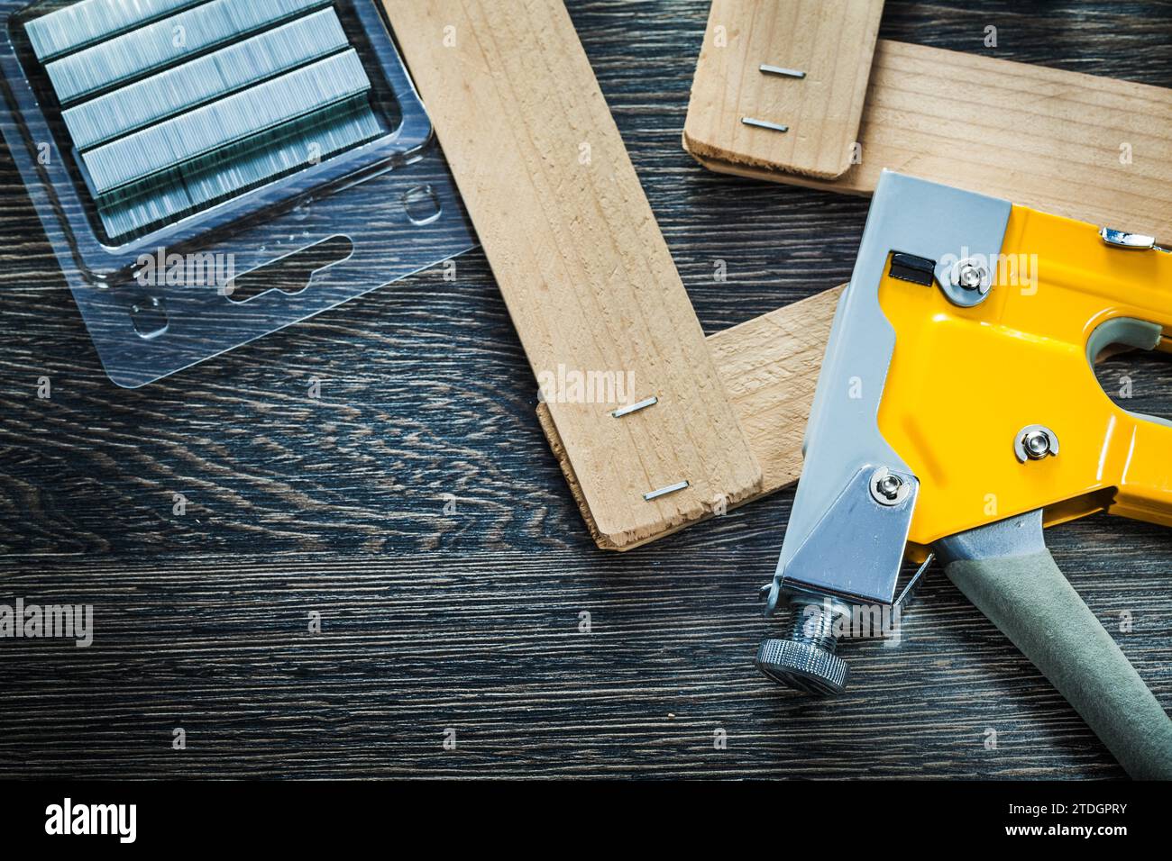 Construction stapler staples wooden planks Stock Photo - Alamy