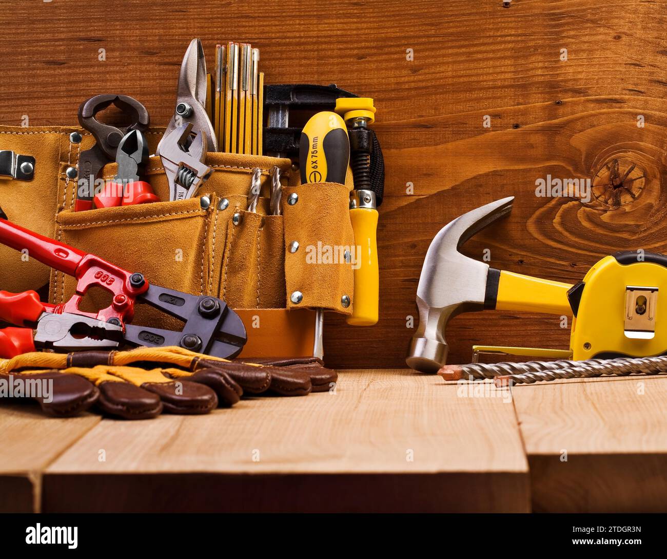 Set of working tools on board with background information Stock Photo ...