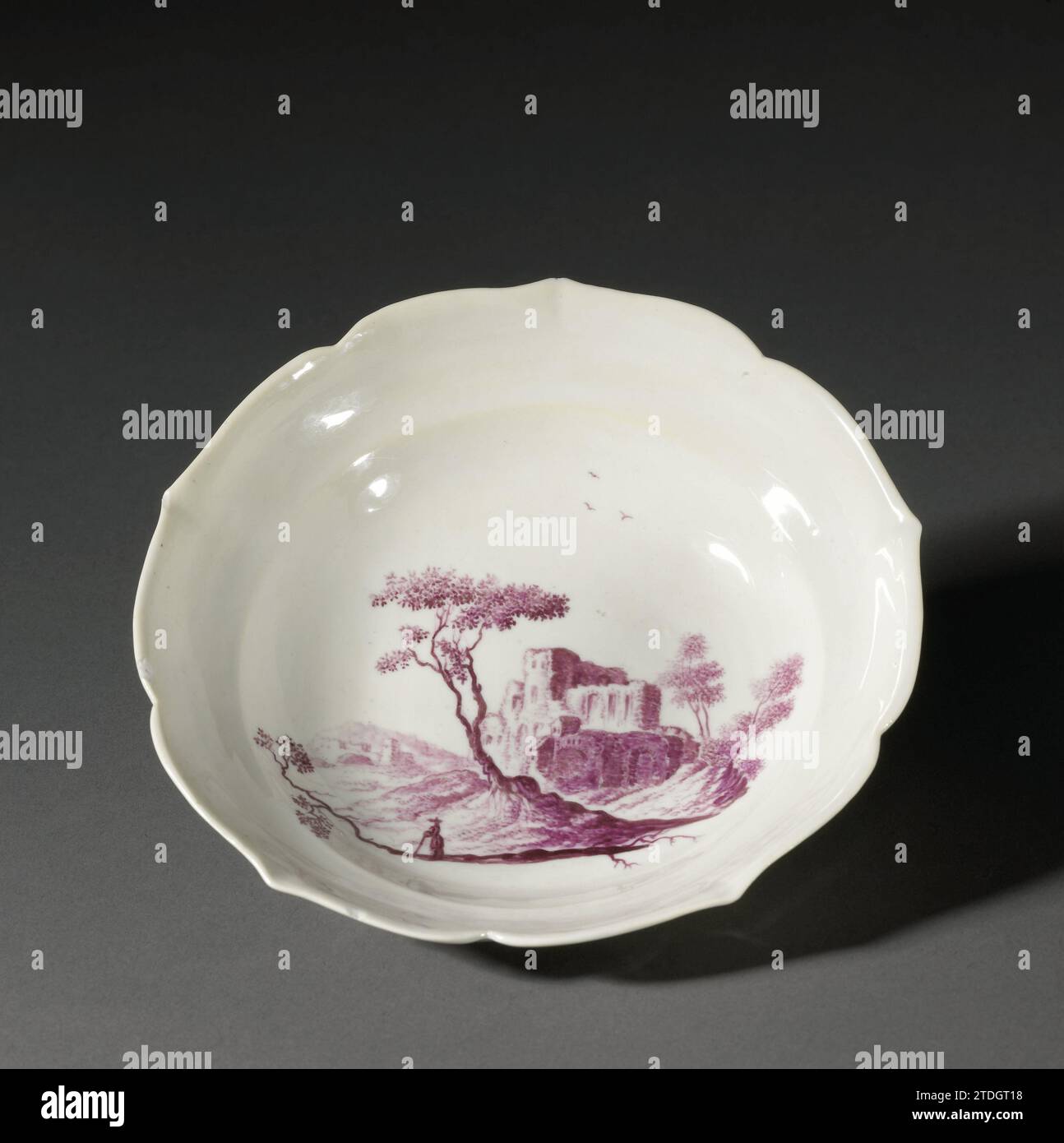 Scale with scalloped edge, painted on the flat in purple with a ...