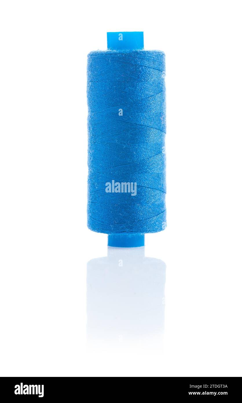 Blue sewing thread Stock Photo - Alamy