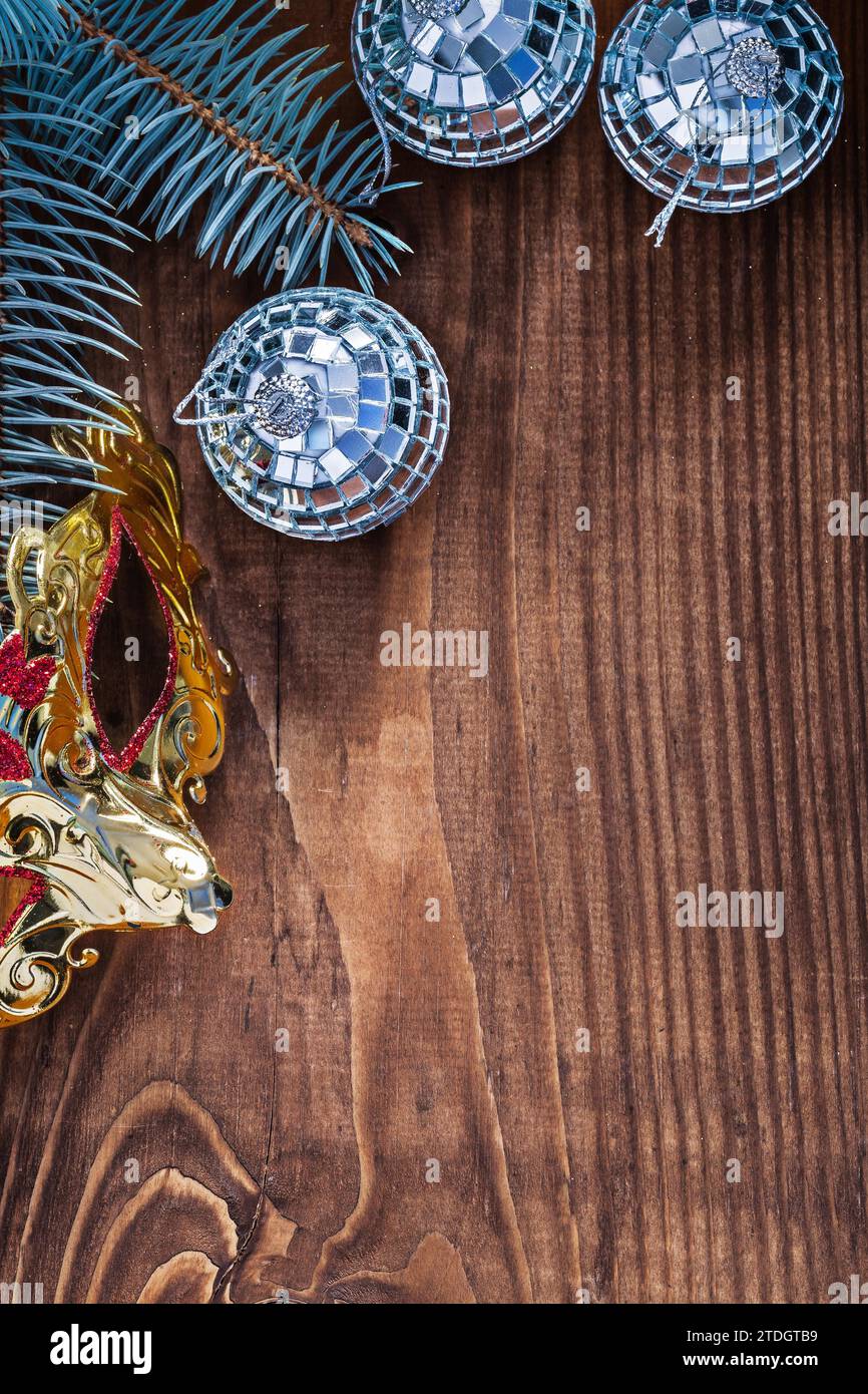 Christmas background mirror disco balls and carnival mask branch of fir ...