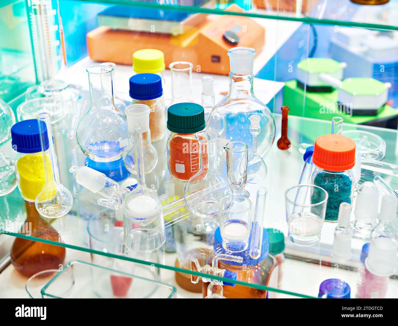 Laboratory glass dishes, bottles, jars and flasks in store Stock Photo ...