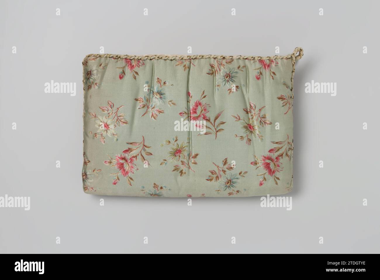 Sachet of blue -green silk on the front A spreading motif of woven pink ...
