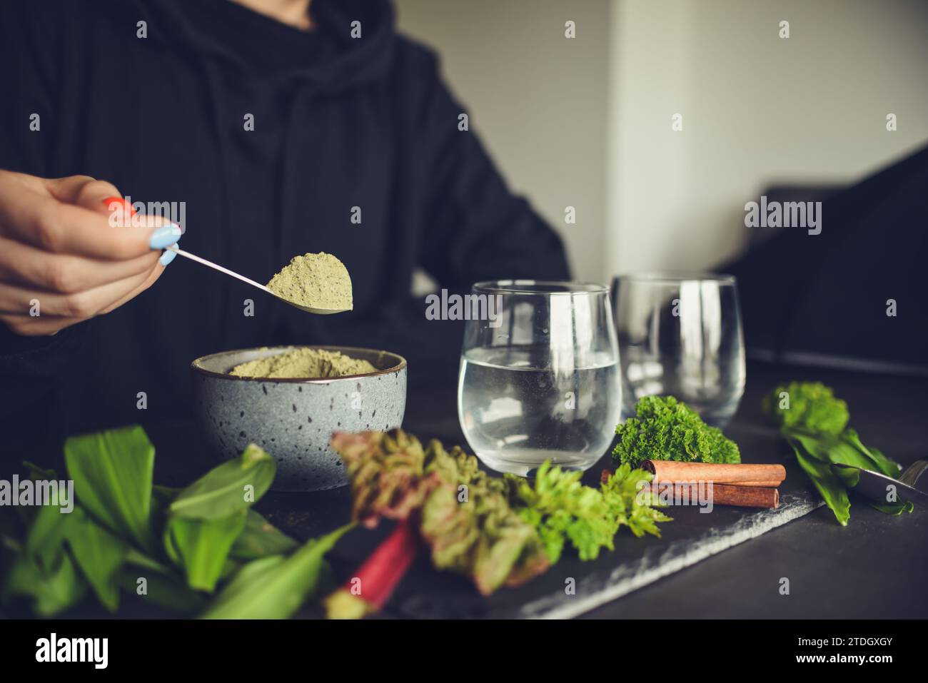 Making healthy green cocktail, in the kitchen Stock Photo - Alamy