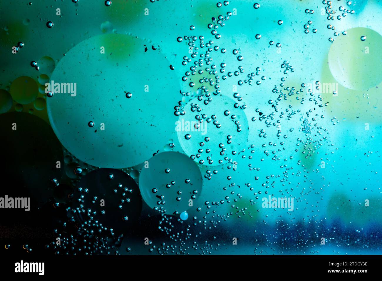 Oil bubbles inside water base form patterns Stock Photo - Alamy