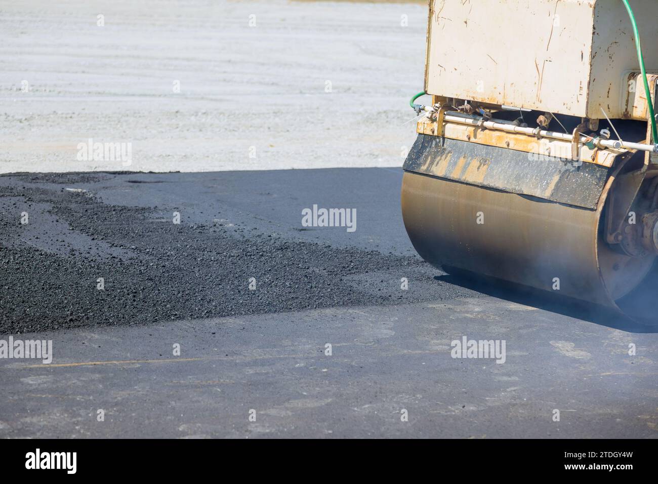 Asphalt machine lays on highway hi-res stock photography and images - Alamy