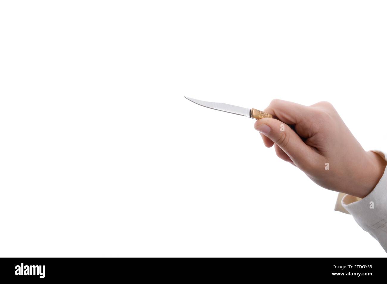 Hand holding a knife in hand on a white background Stock Photo - Alamy