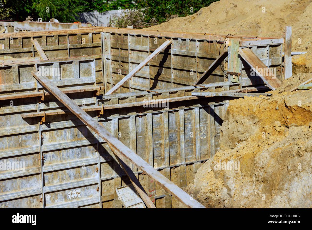 Several pieces of metal formwork have been assembled in preparation for ...