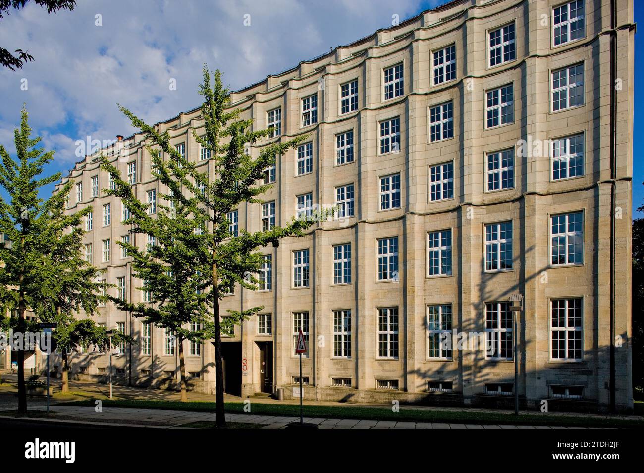 The modern 6-storey concrete frame building with a traditional sloping ...