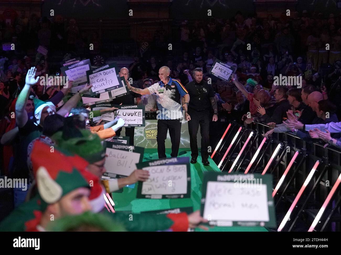 Mario Vandenbogaerde makes his way to the oche to face Thibault Tricole ...