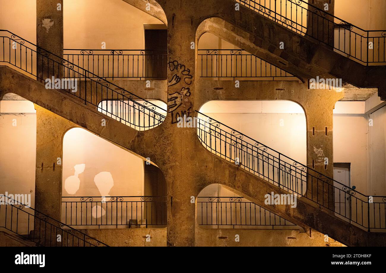 The stairs of the famous Cour des Voraces, old Lyon. Historic Staircase ...
