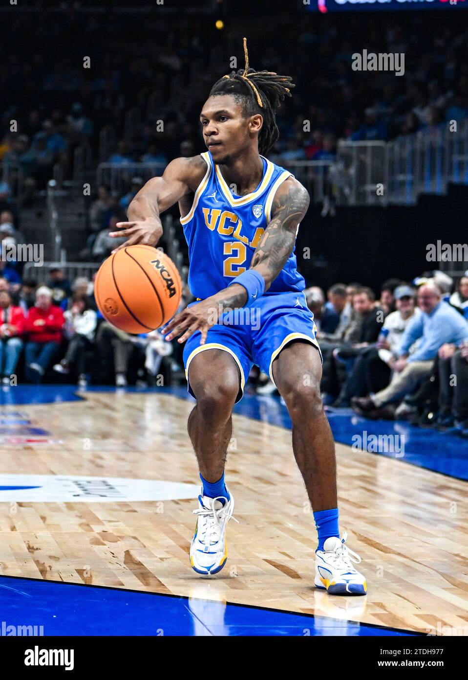 ATLANTA, GA – DECEMBER 16: UCLA guard Dylan Andrews (2) passes the ball ...