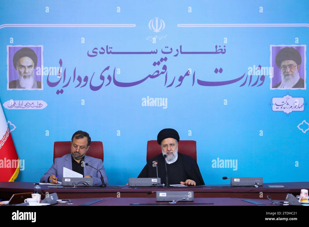 Tehran, Iran. 18th Dec, 2023. Iranian President EBRAHIM RAISI (C) and ...
