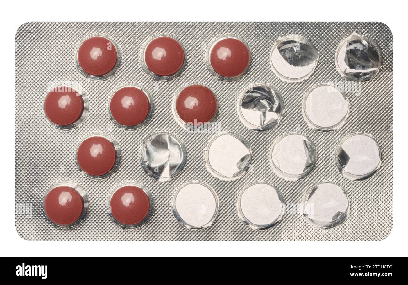 Round brown tablets in blister pack, top view Stock Photo - Alamy