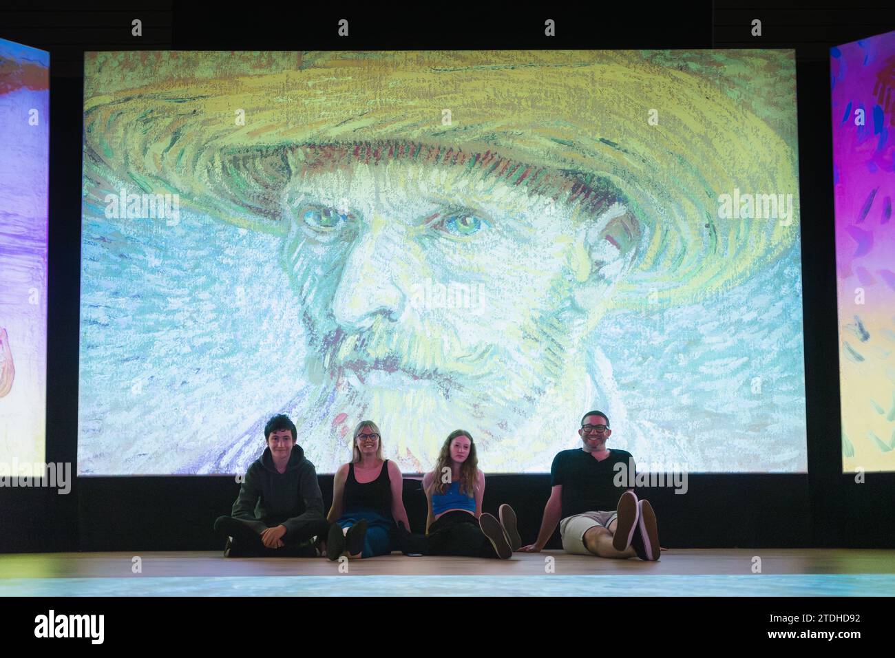 A family enjoy a day out at the Van Gogh Alive interactive exhibition ...