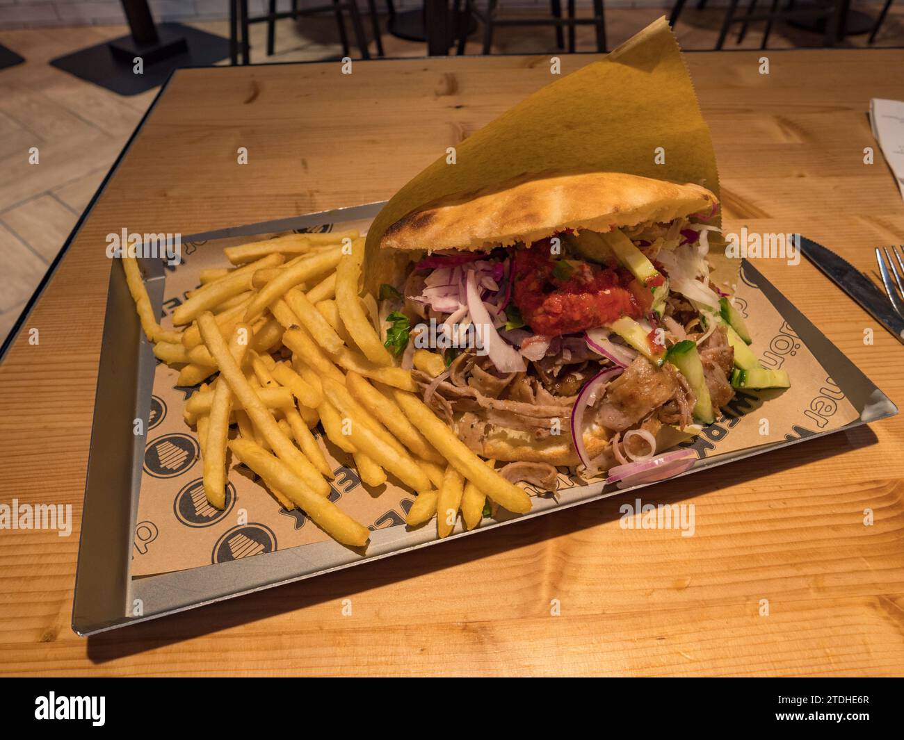 A donor kebab and fries served in a branch of Donerwerk in Kiel ...