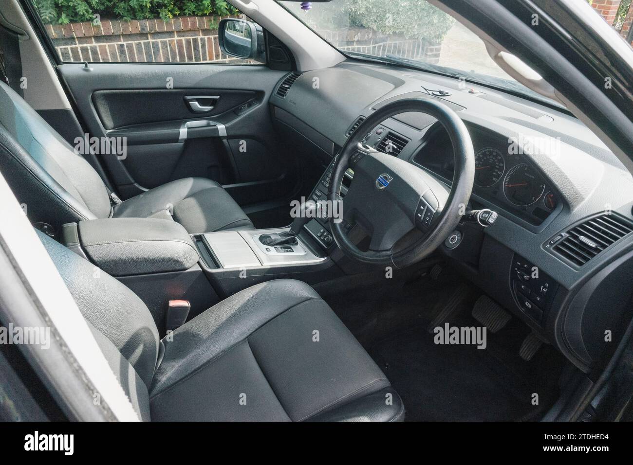 Photos of a large 4x4 Volvo XC90 SUV parked on a suburban British ...