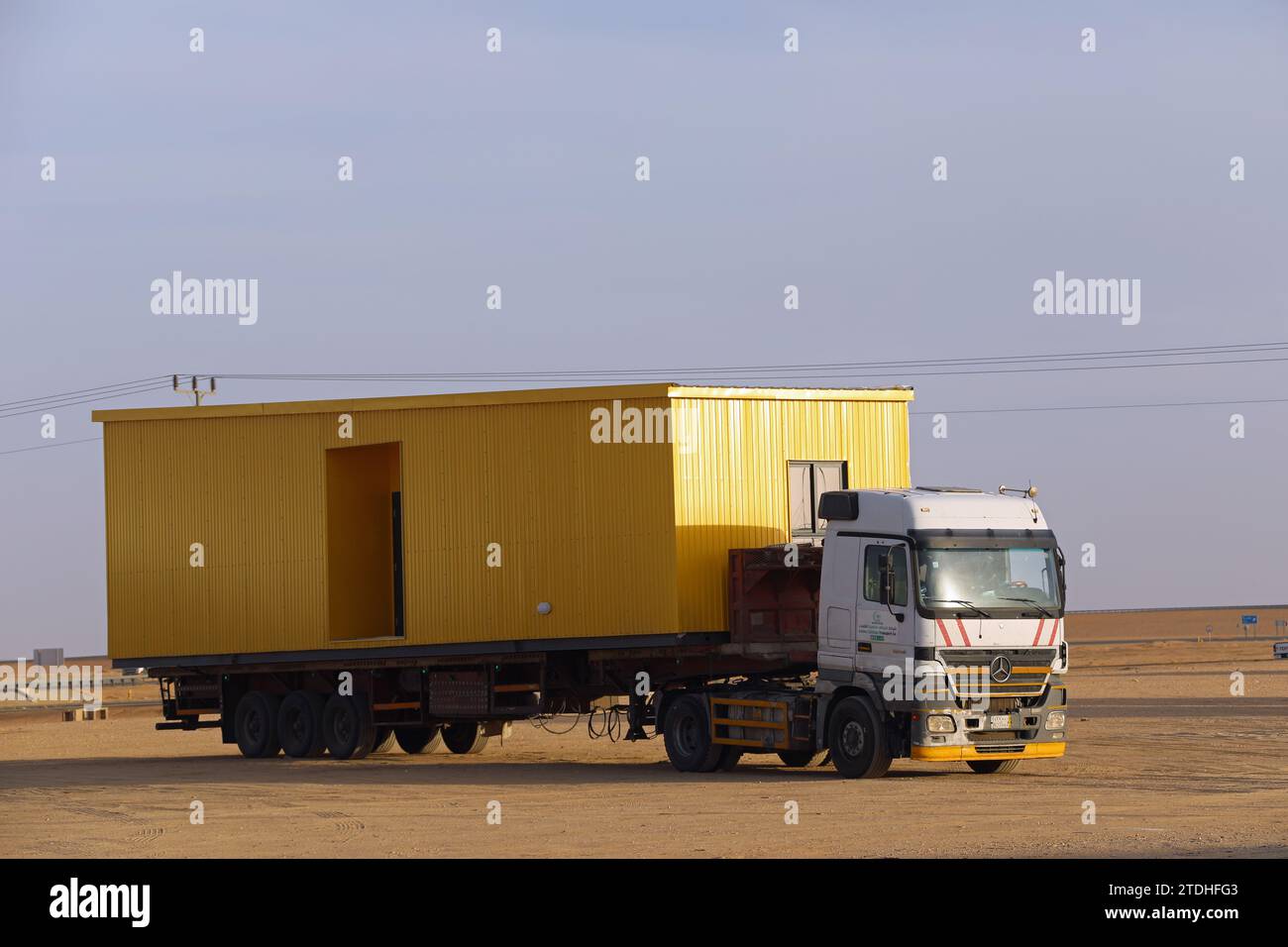 Prefabricated building being transported in Saudi Arabia Stock Photo ...