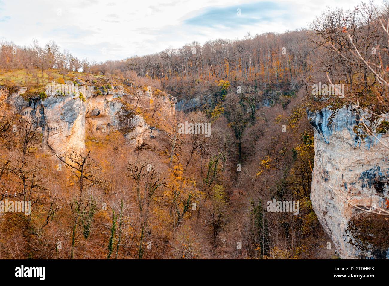 Forested mountains and a gorge below. Lago Naki plateau in autumn ...