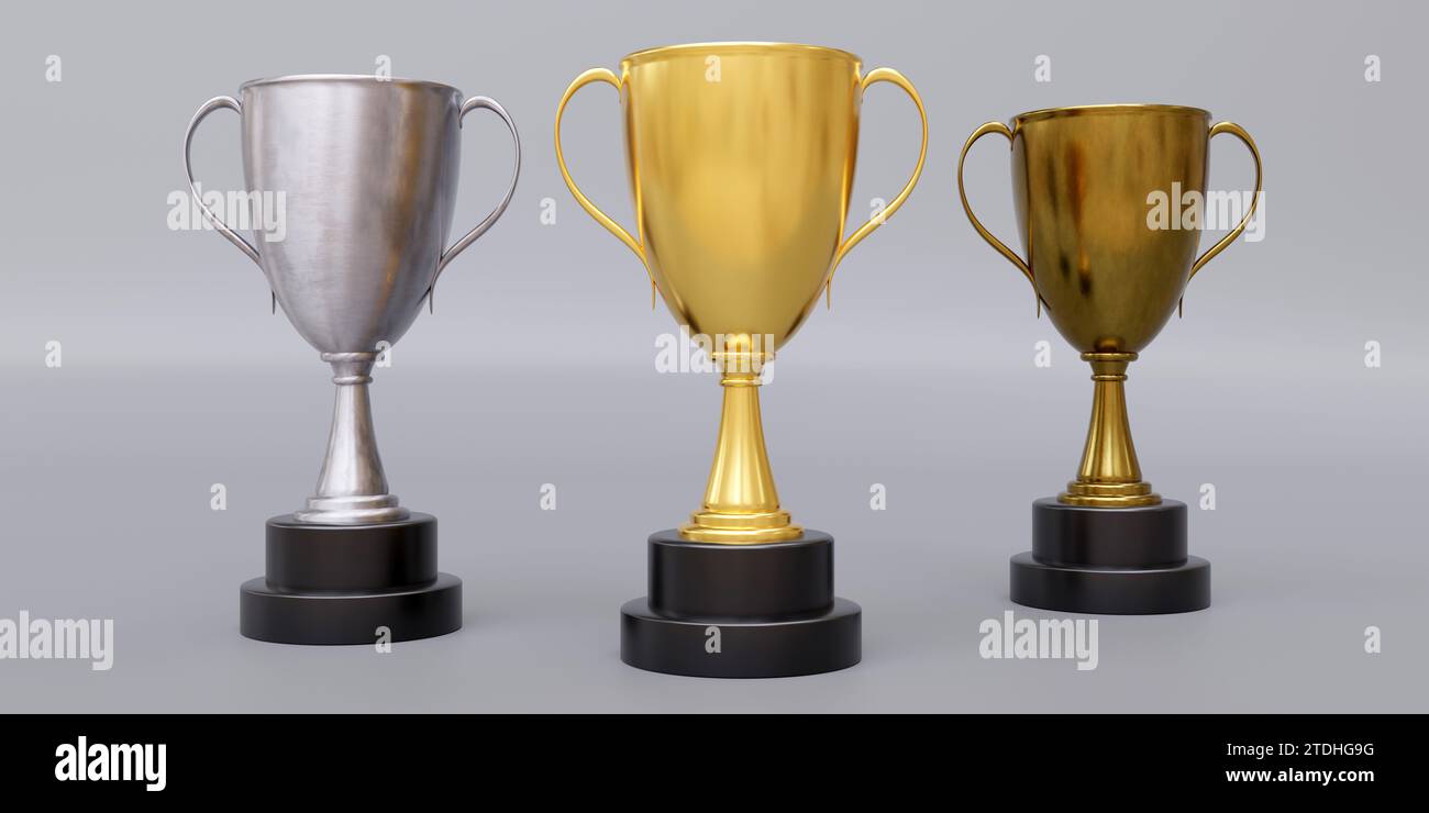 Gold silver bronze trophy cup with dual handle on grey background. A ...