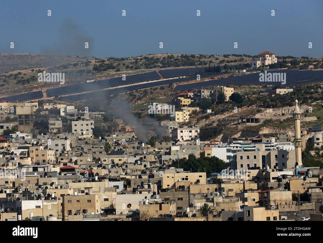 Tubas. 18th Dec, 2023. Smoke rises during clashes in the West Bank city ...