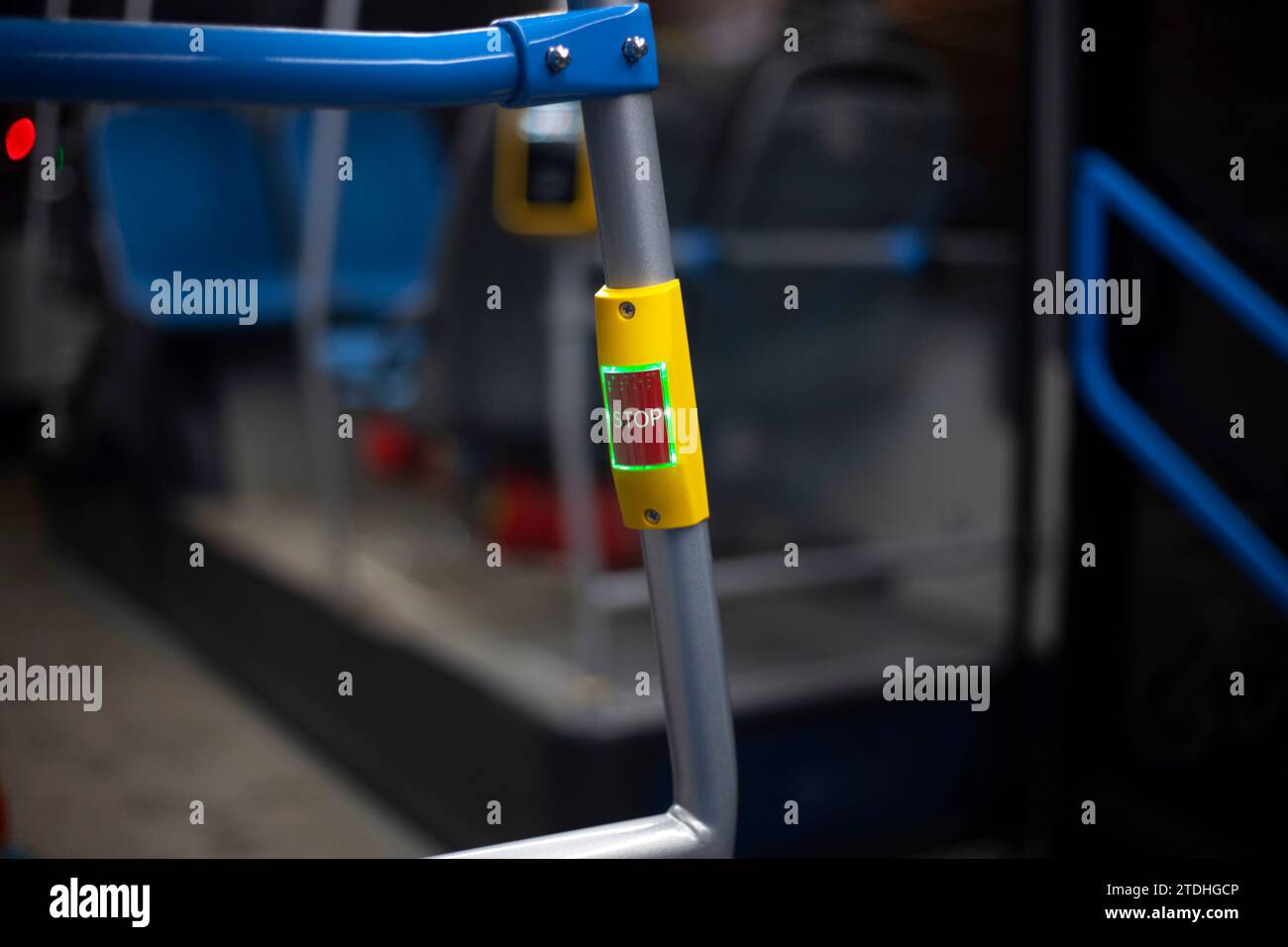 Stop button on the bus. Interior of public transport. Stop button on ...