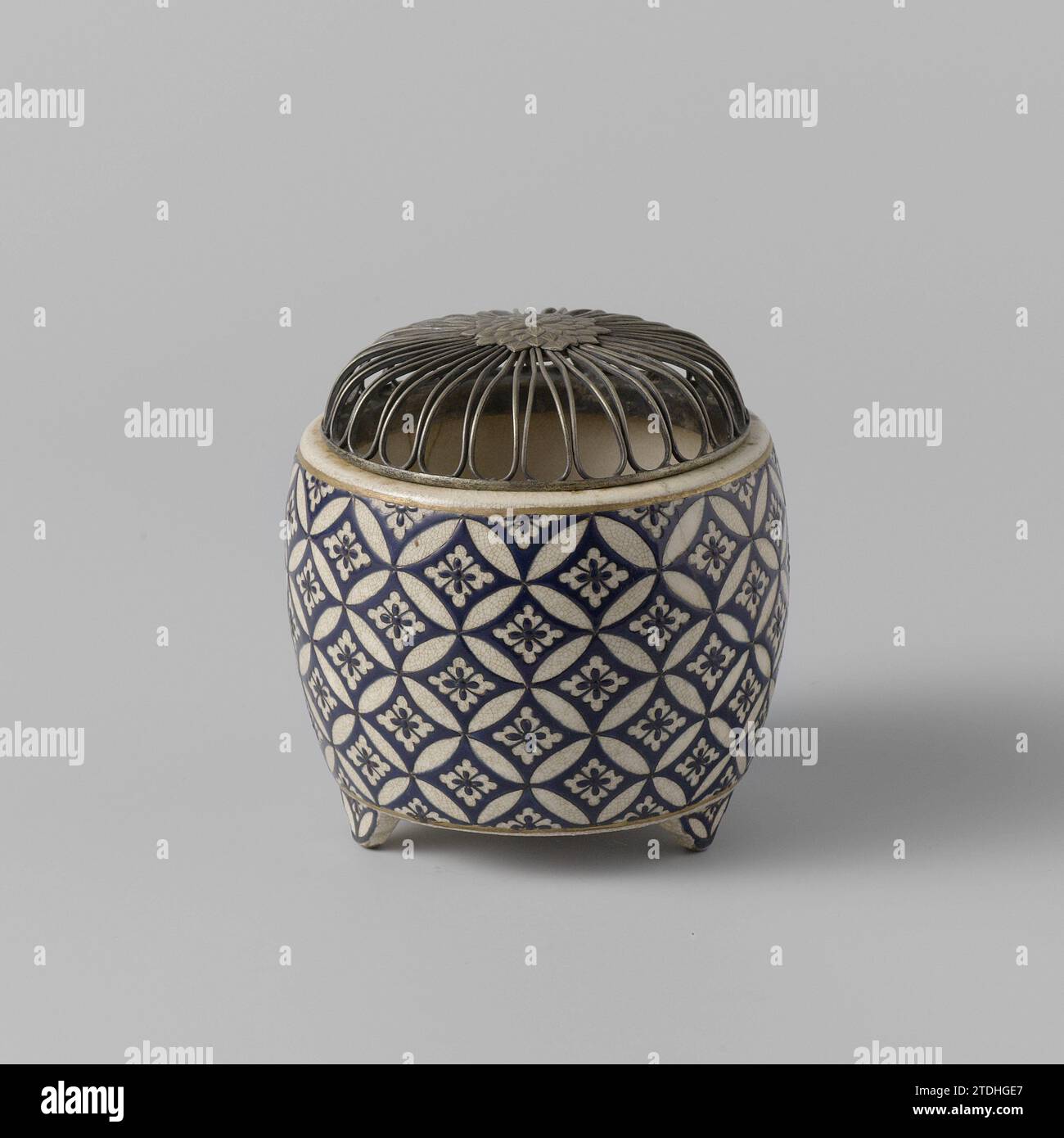 Charcoal burner with geometrical pattern and metal cover, anonymous ...
