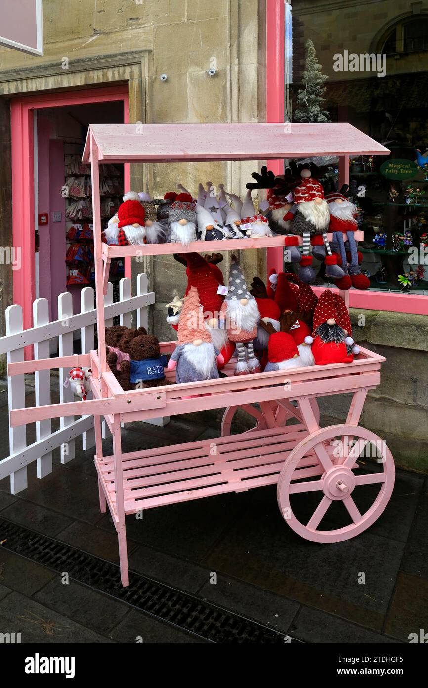 Cute comic Christmas toys for sale display on a pink barrow, outside ...