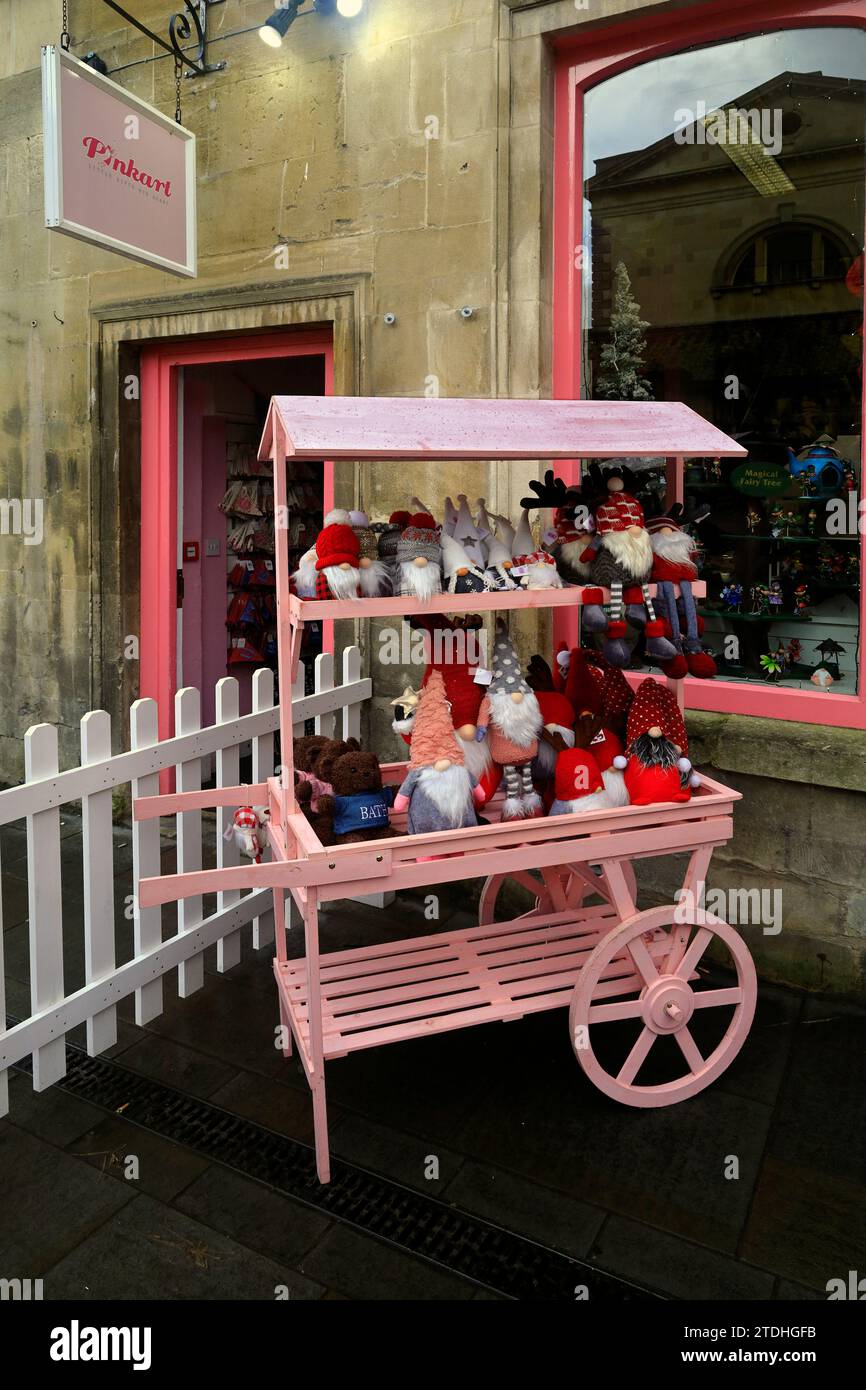 Cute comic Christmas toys for sale display on a pink barrow, outside ...