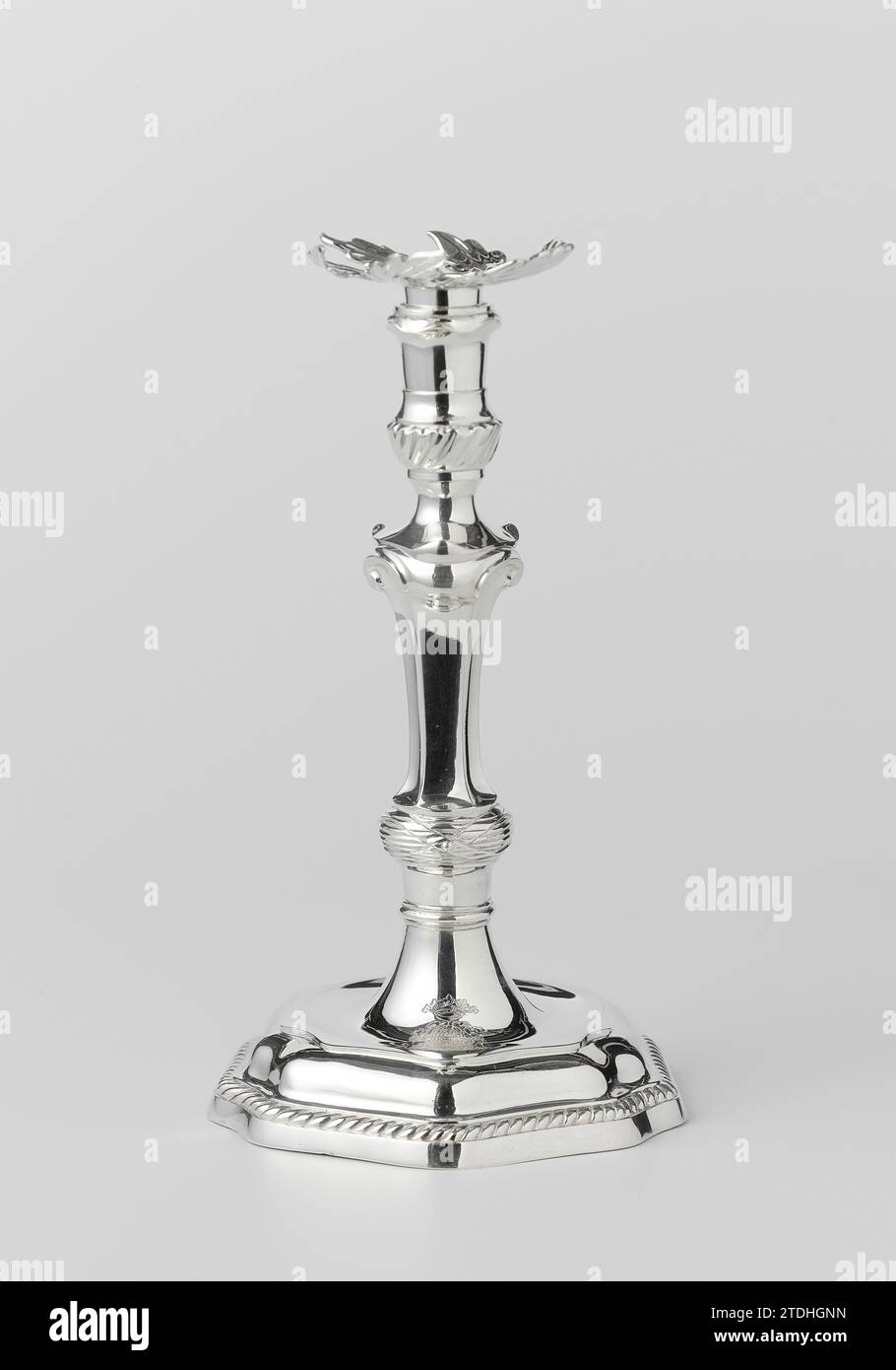 Candlestick of silver with hexagonal base and trunk and with a fat ...