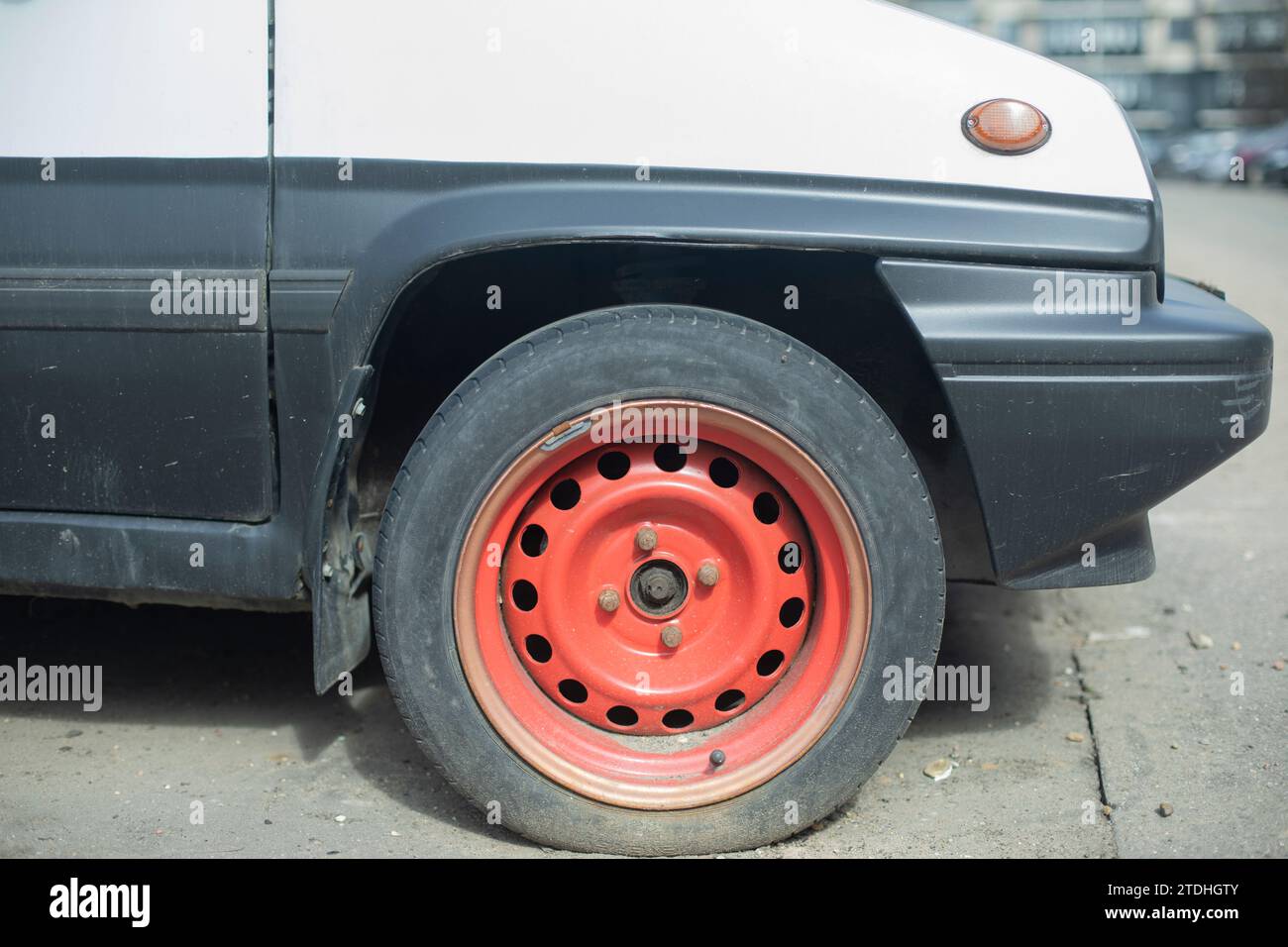 Red wheel of car. Car is in parking lot. Front wheel. Red Disc Stock ...