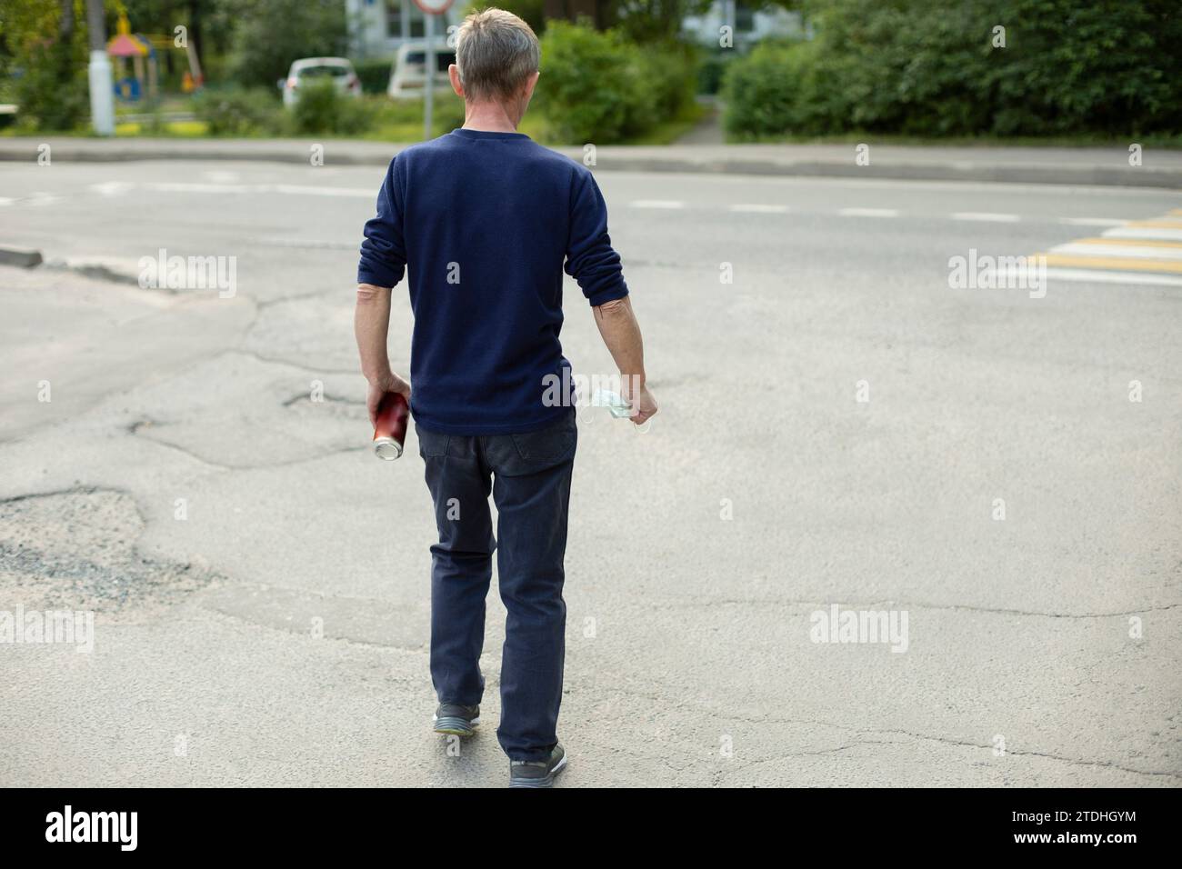 Man goes on road. Man walks through transition. Guy on street. Walking ...