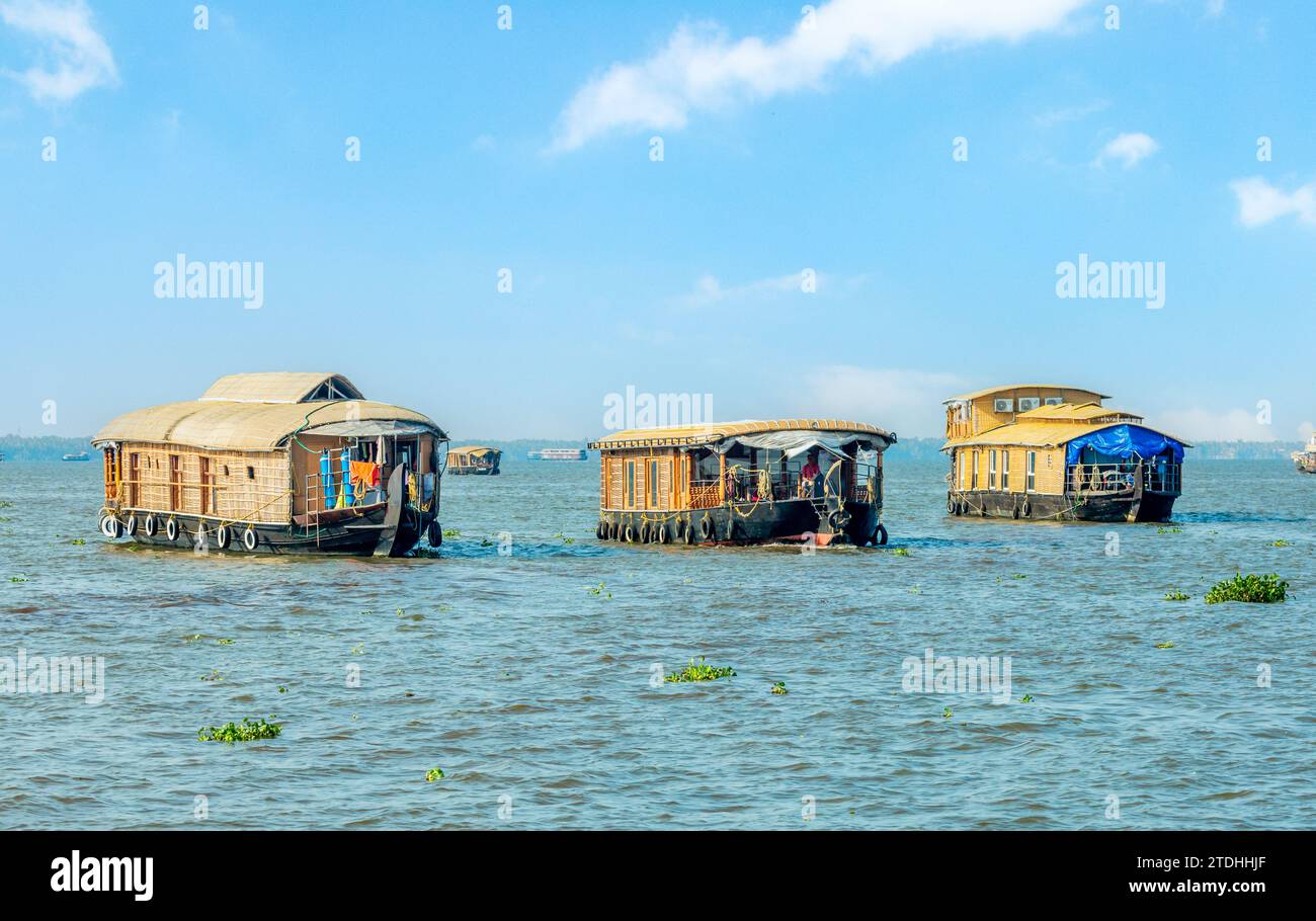 Indian traditional floating houseboats homes on Pamba river backwaters ...