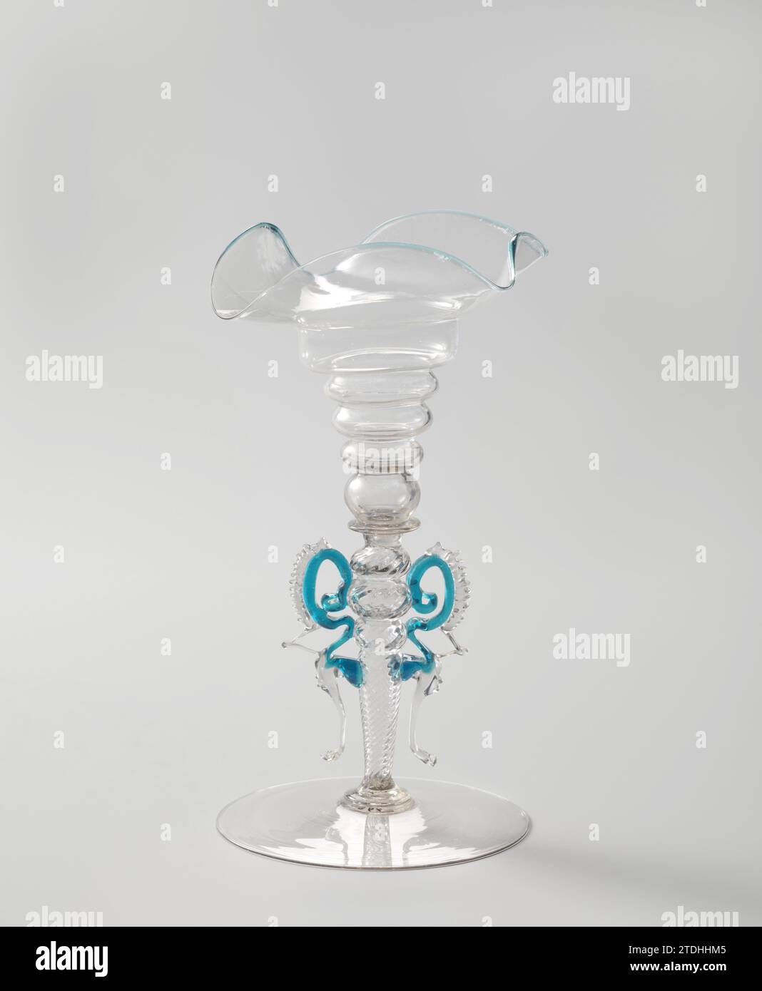 Wing glass with a funnel -shaped, twisted chalice with rim folded in a ...