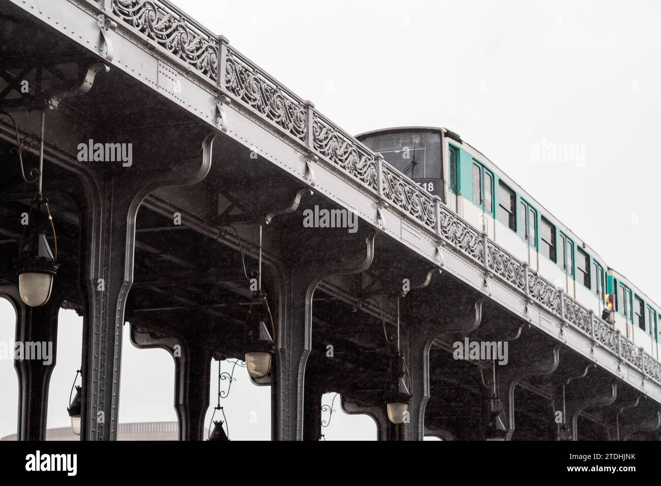 Photo of a line 6 metro train passing over the Bir Hakeim bridge in the ...