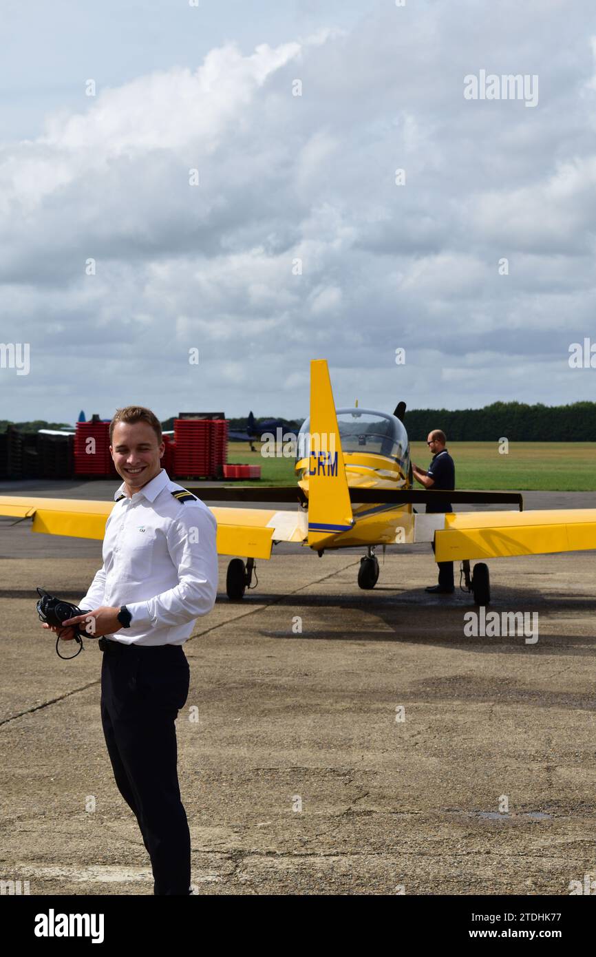 Student pilot with two golden stripes on shoulder epaulette smiling in ...