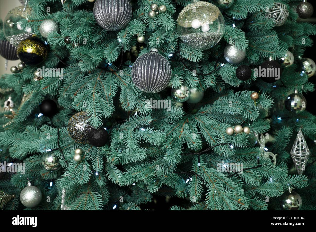 decorated Christmas tree in gray tones Stock Photo - Alamy