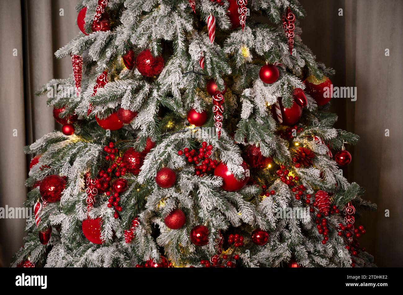 Christmas tree decorated in red colors Stock Photo - Alamy