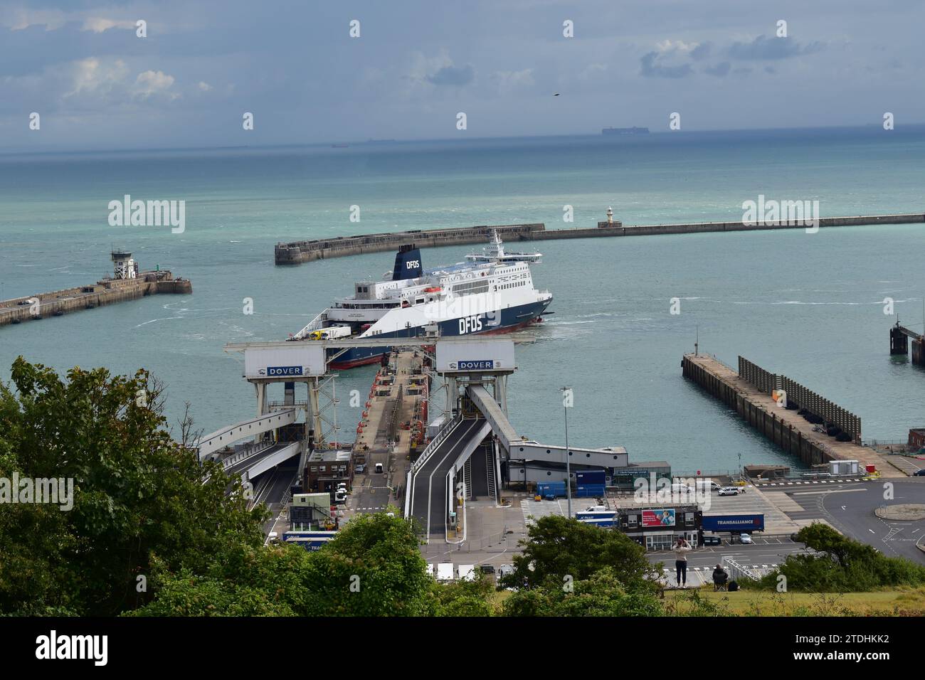 A DFDS car ferry ship turning around in the sea water in the port of ...