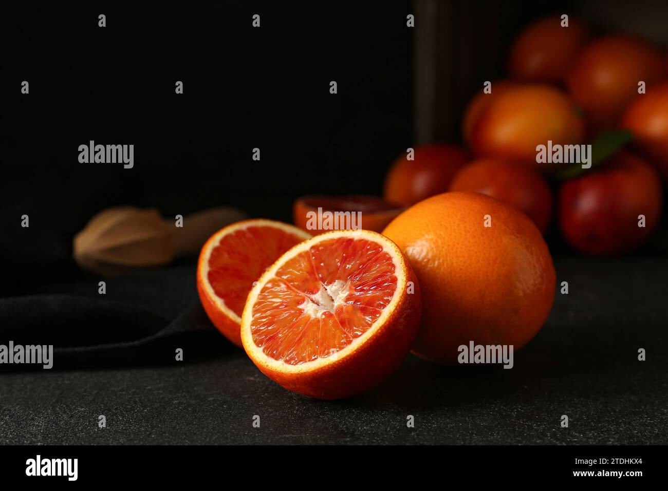 Tasty blood orange fruits on dark background Stock Photo - Alamy