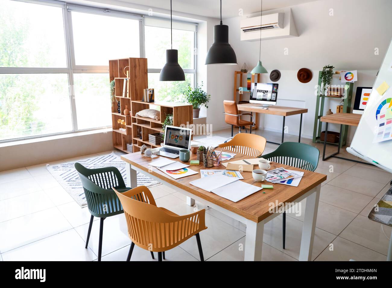 Interior of office with graphic designer's workplaces Stock Photo - Alamy